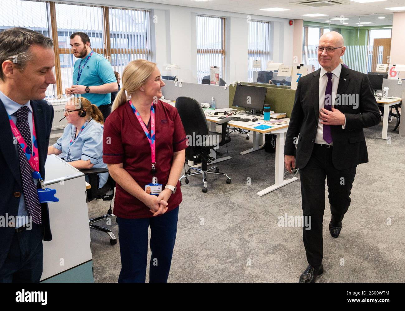 First Minister John Swinney with Patrick Rafferty Assistant Director of ...