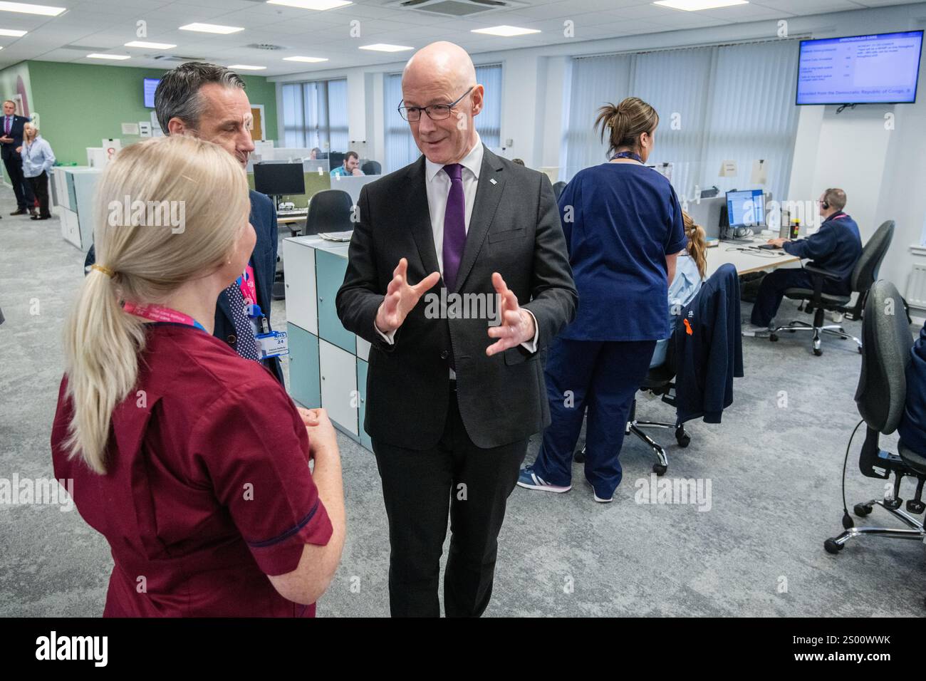 First Minister John Swinney with Patrick Rafferty Assistant Director of ...