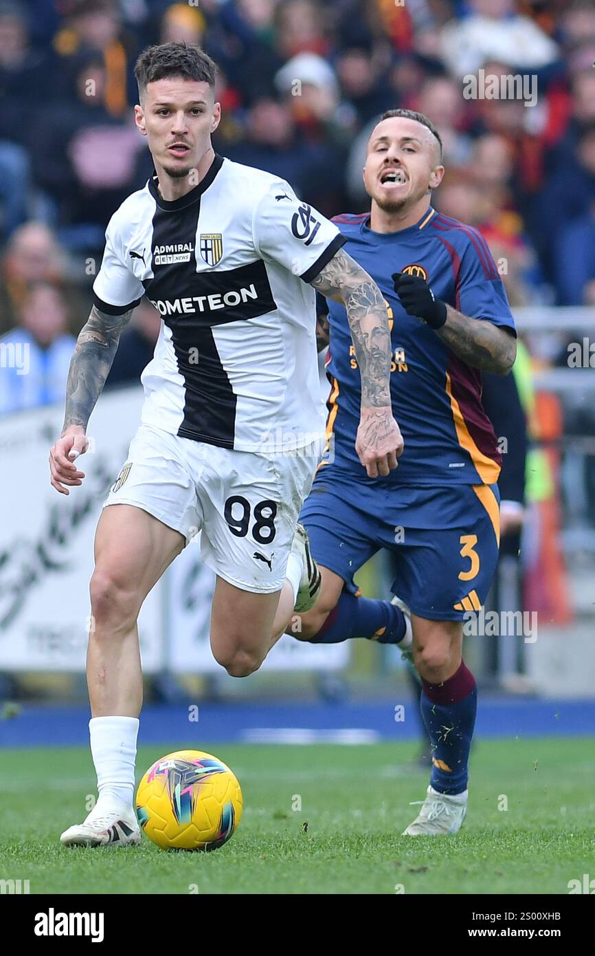 Dennis Man of Parma (L) and Angelino of AS Roma (R) seen in action ...