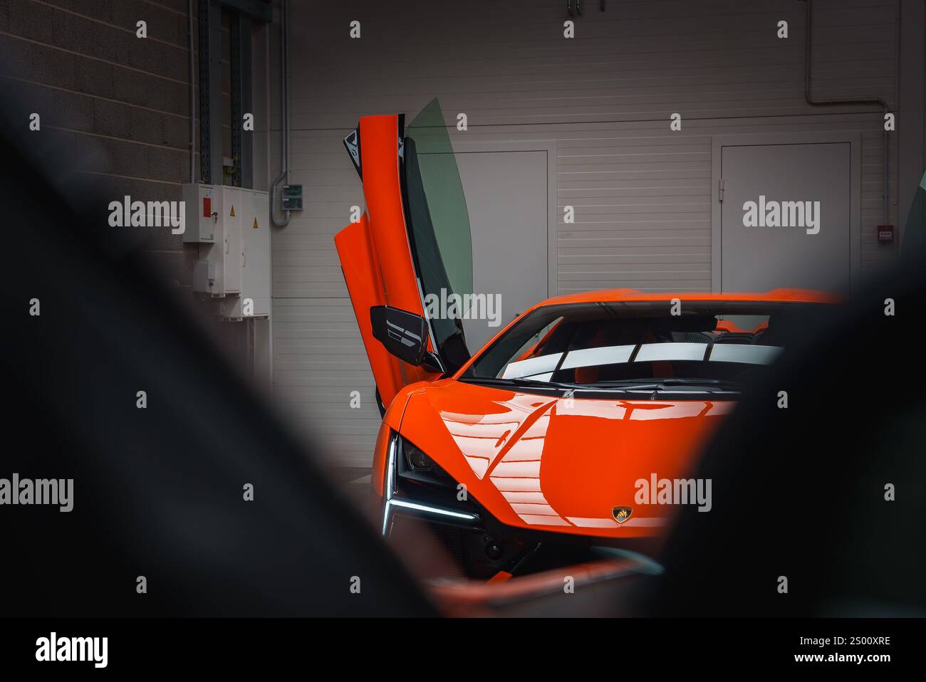 Close Up of Lamborghini Revuelto with Open Scissor Door Indoors Stock ...