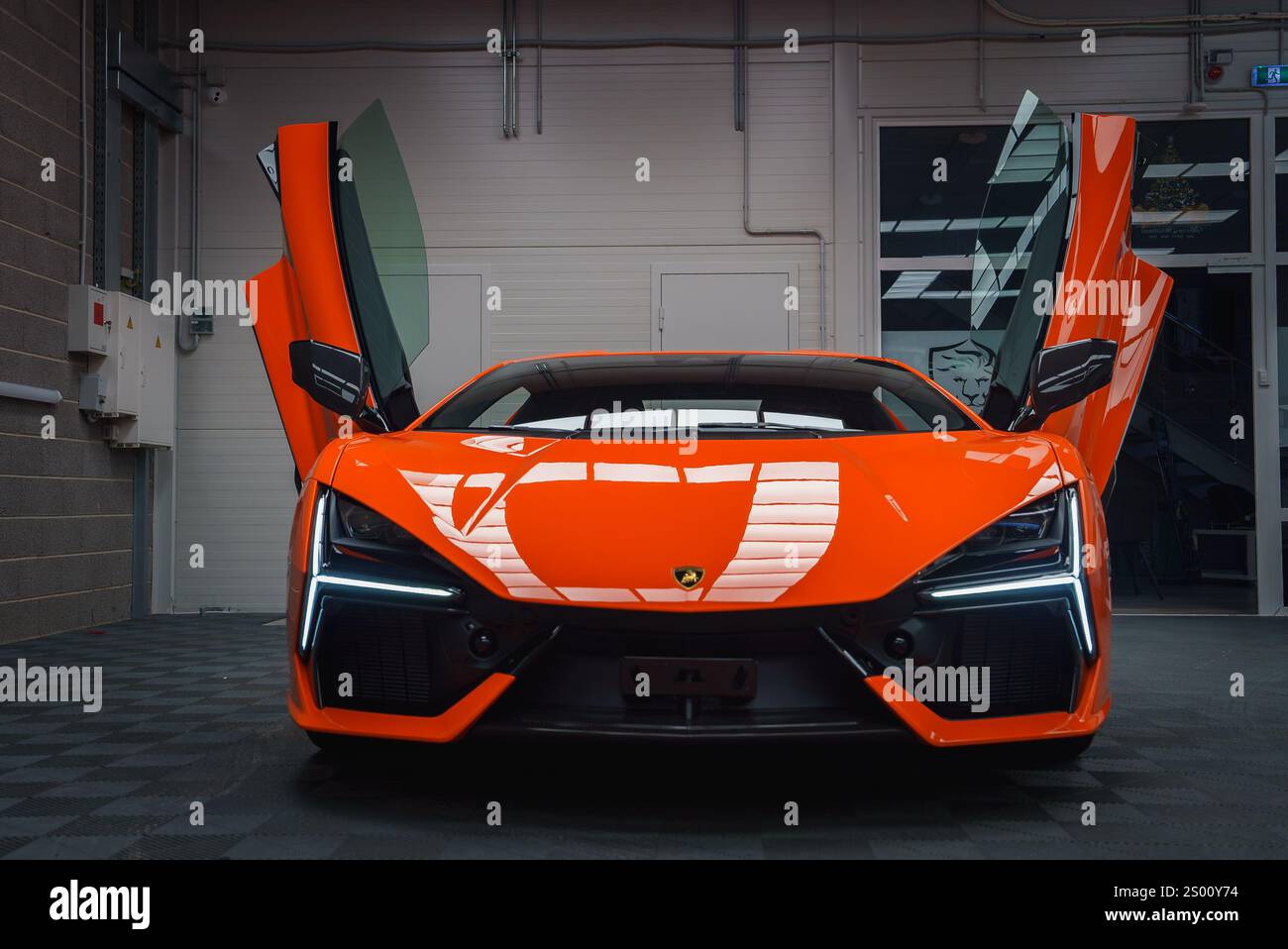 Lamborghini Revuelto with Scissor Doors Open in Indoor Setting Stock ...