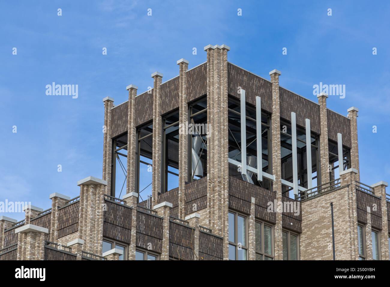 Wind turbine on the roof of a modern newly built house in Utrecht, the ...