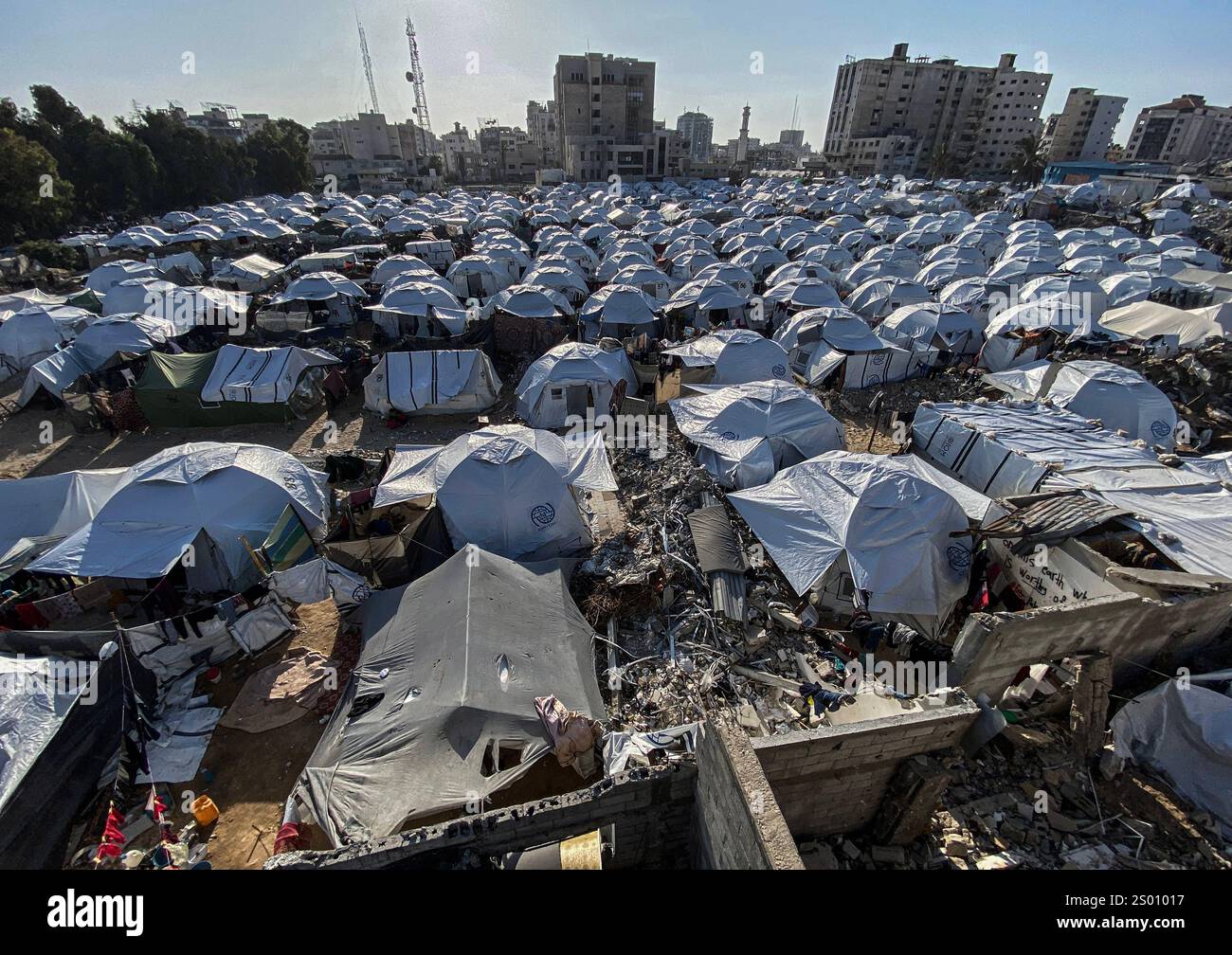 Palestinians continue to live with limited resources in the makeshift ...