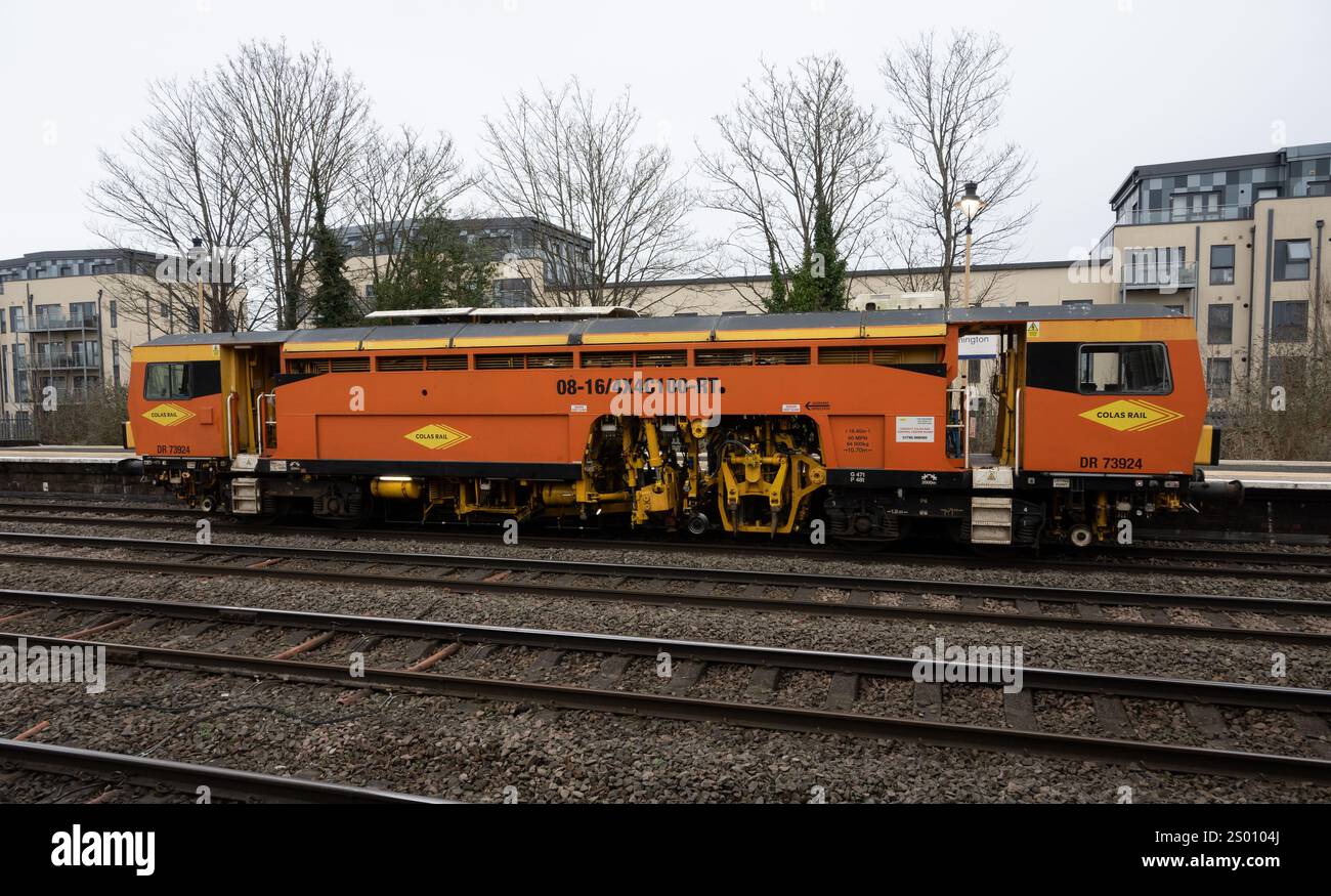 Colas Rail tamper No. DR73924 at Leamington Spa station, UK Stock Photo ...