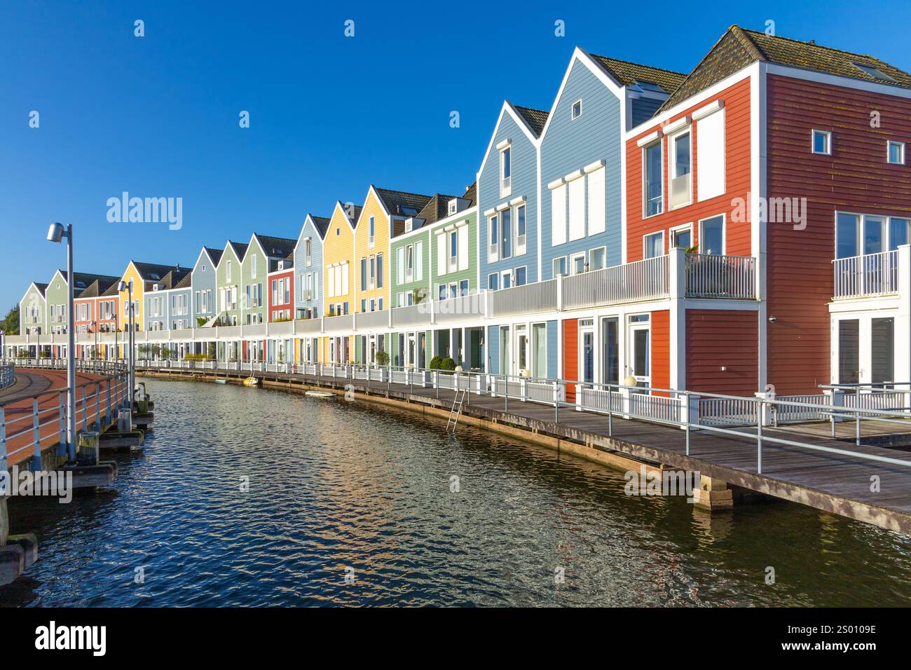 Modern Multi Colored houses in Houten, the Netherlands. Morning blue ...