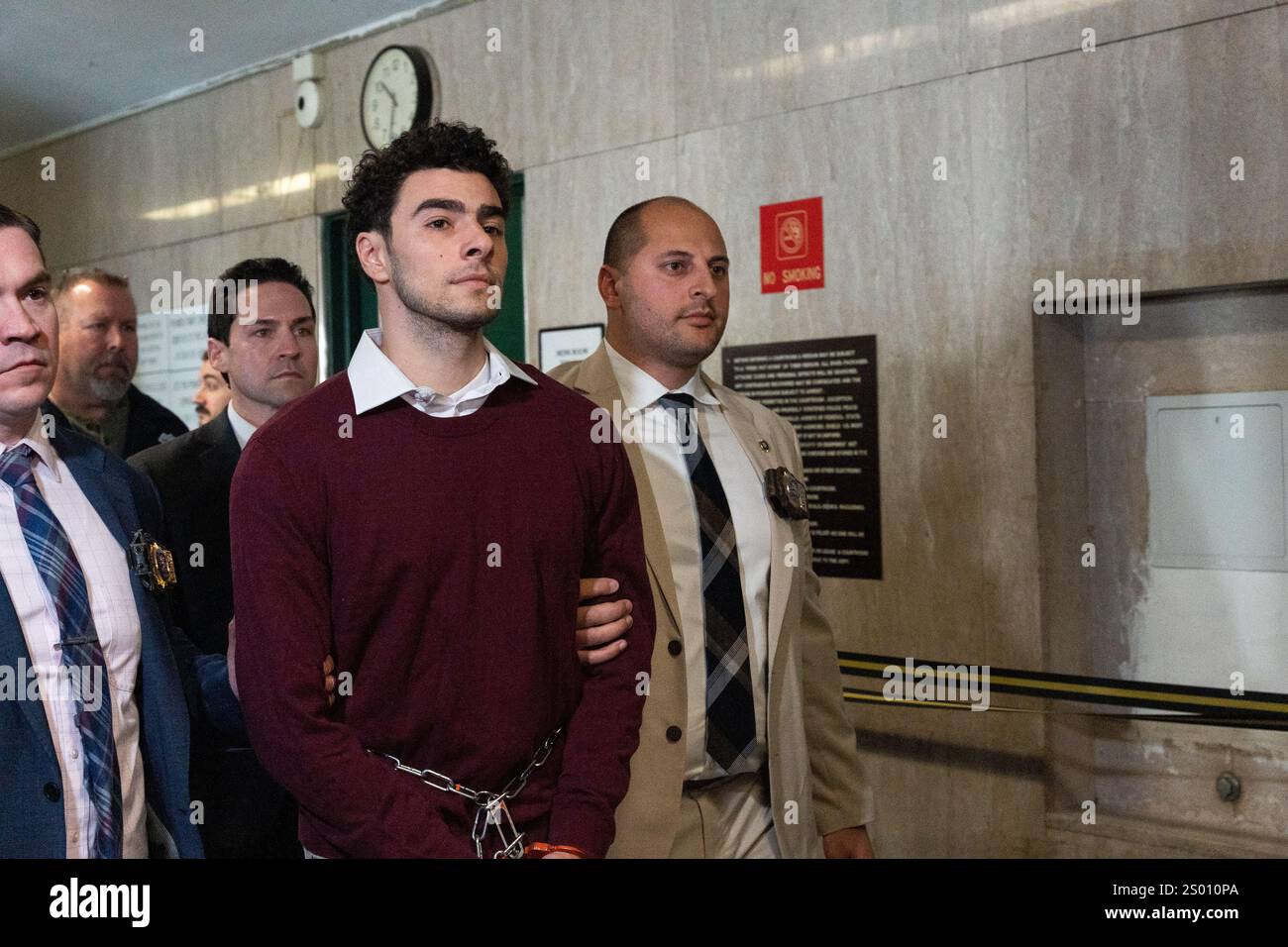 UnitedHealthcare CEO shooting suspect Luigi Mangione is seen entering ...