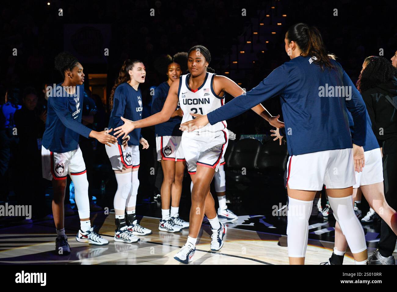 December 17, 2024: UConn Huskies forward Sarah Strong (21) high fives ...