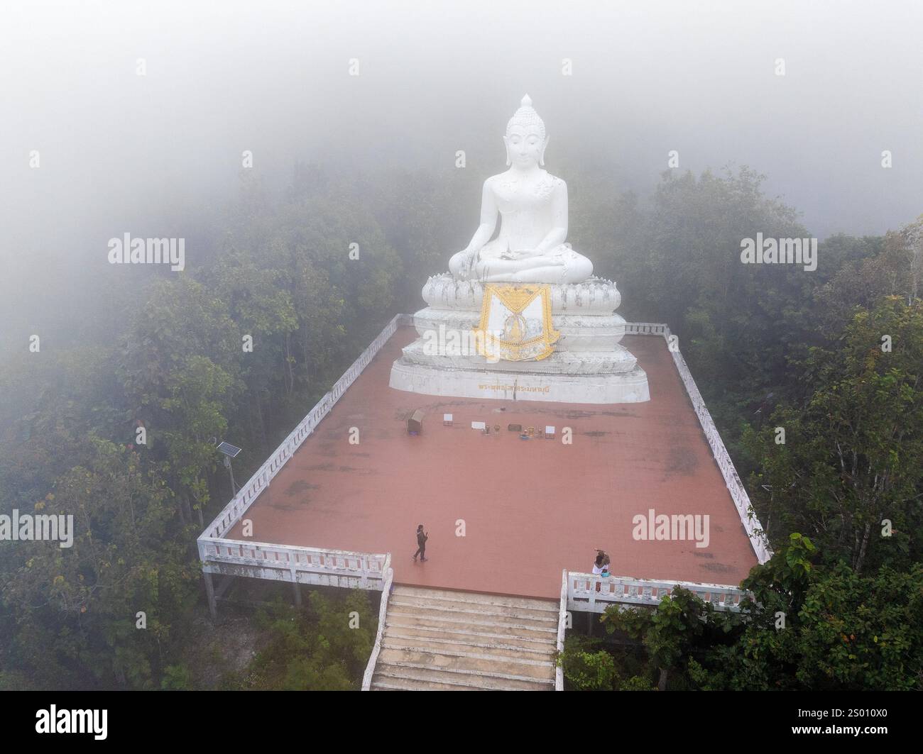 Aerial view of the big white Buddha in fog, Pai Town, Thailand Stock ...
