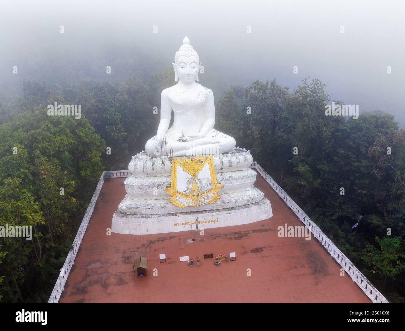Aerial view of the big white Buddha in fog, Pai Town, Thailand Stock ...