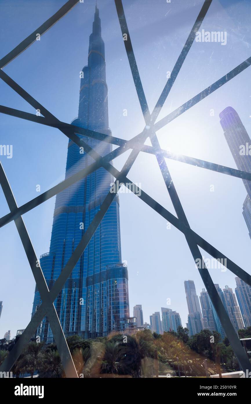 Dubai, UAE - December 9, 2024: Futuristic view of tallest tower Burj Khalifa through glass with ...