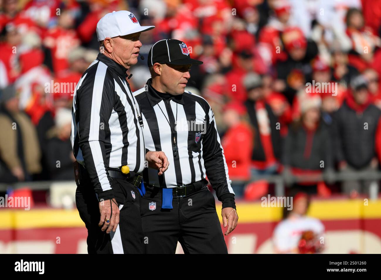 Referee Carl Cheffers, left, and field judge Steve Zimmer, right ...