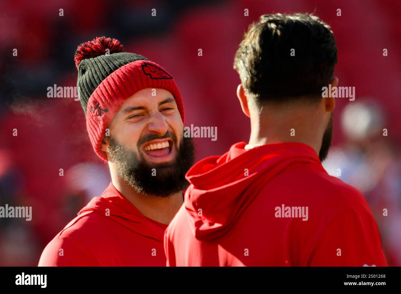 Kansas City Chiefs tight end Noah Gray, left, laughs with Chiefs tight ...