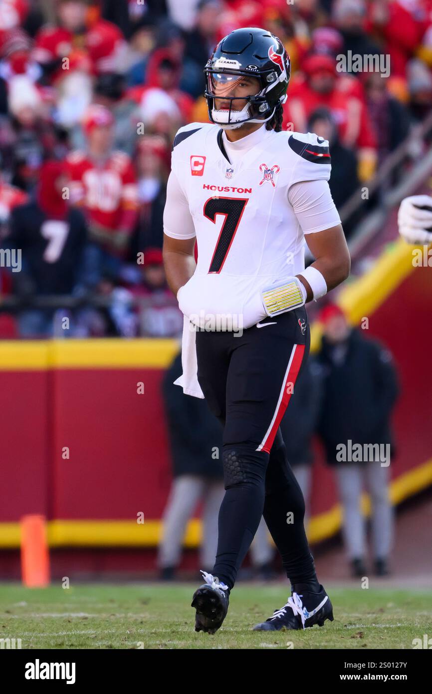 Houston Texans quarterback C.J. Stroud walks off the field after a failed third down attempt ...