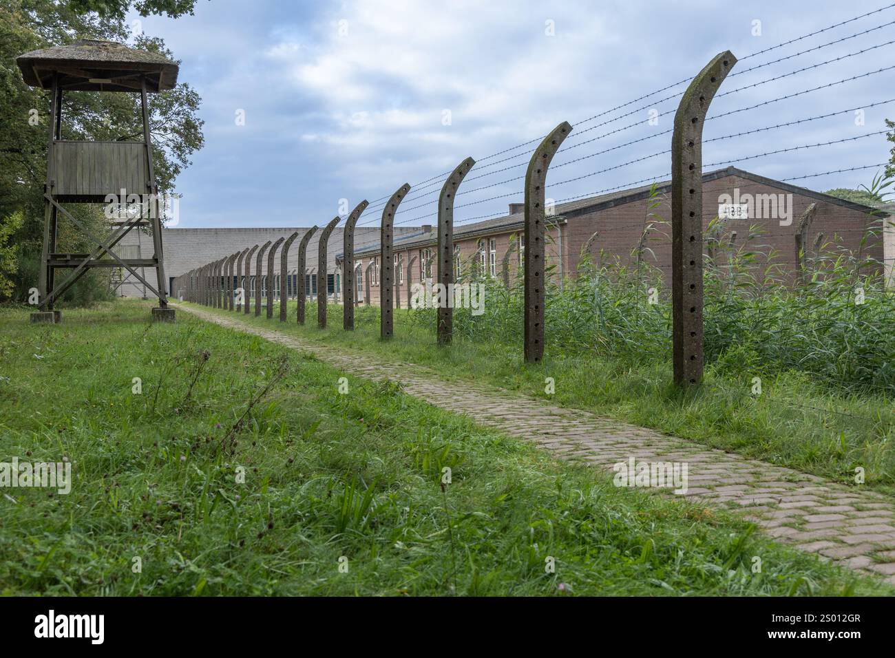 Watchtower and observation tower at concentration camp Vught and fences ...