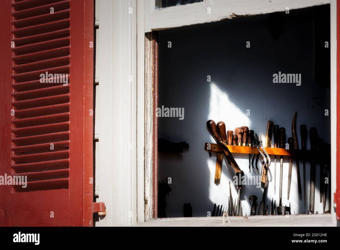 A view through a window in to the Gunsmith Shop in the colonial ...