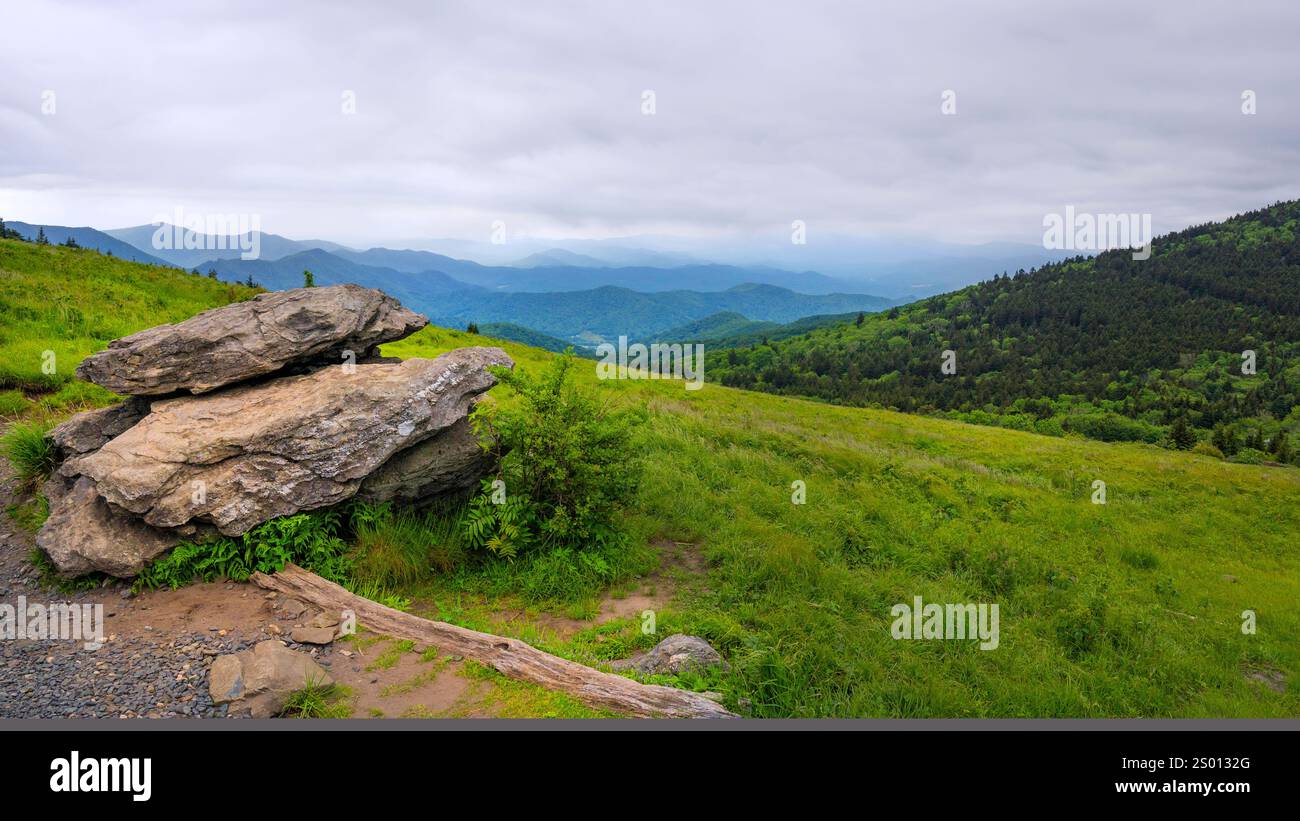 Large Rocks provide foreground interest in this mountain view from the ...