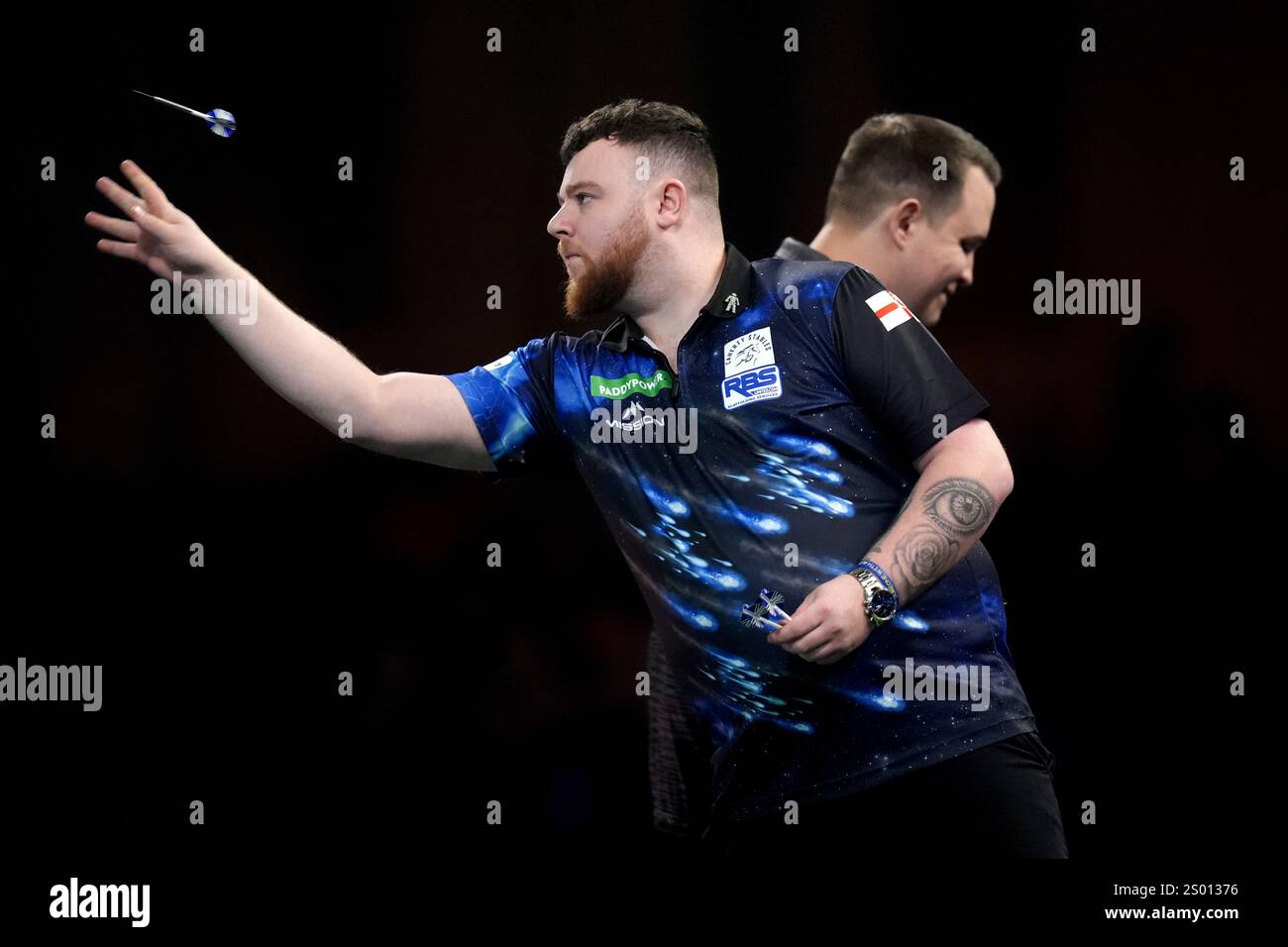 Josh Rock throws during his match against Rhys Griffin during day nine ...