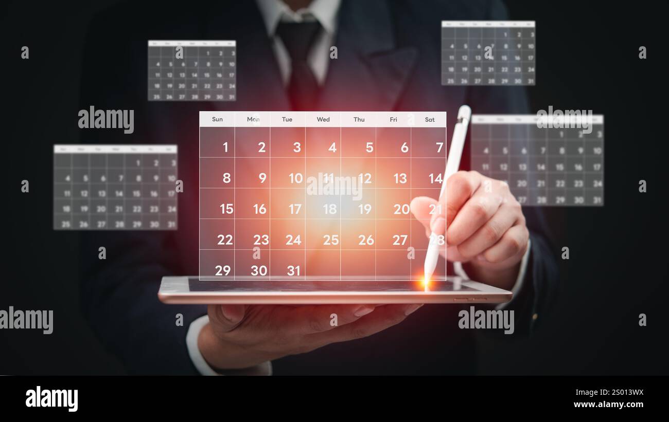 Hand managing a digital calendar on a tablet, showcasing efficient ...