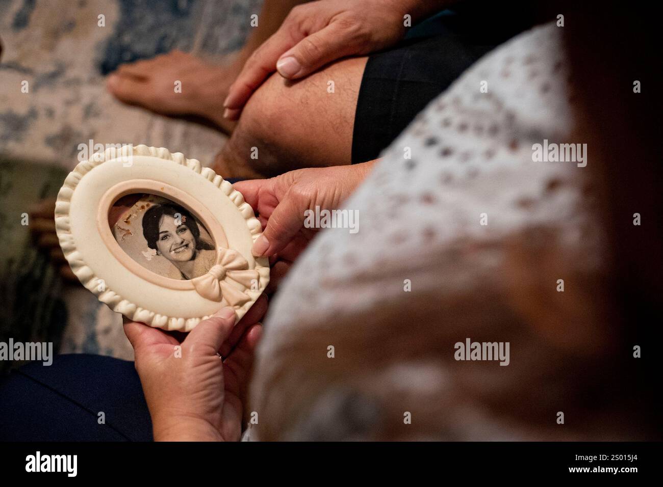 Tamara Akiona holds a photograph of her mother at her home, Thursday ...