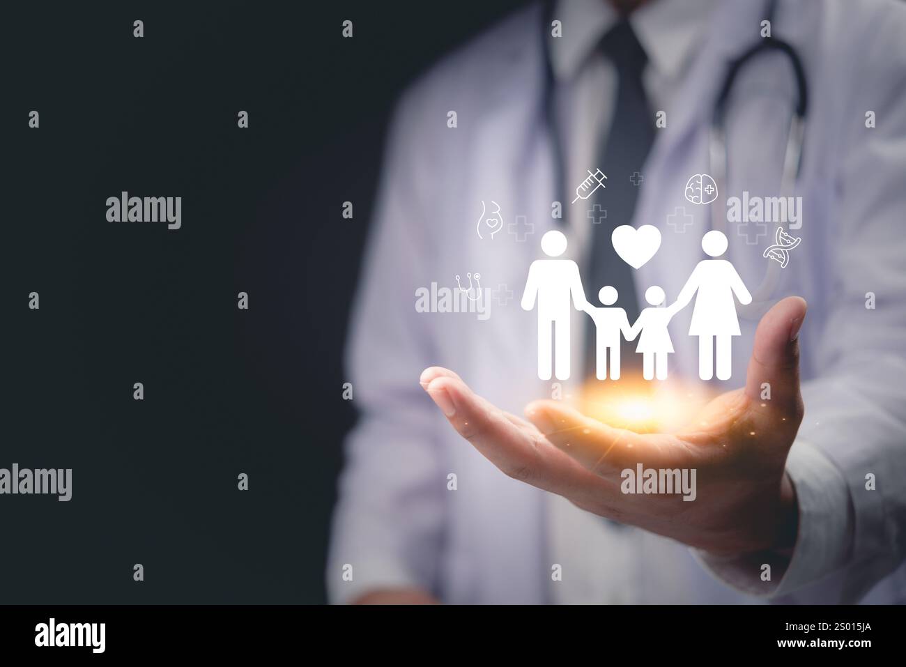 Doctor holding a family icon with health symbols, representing ...