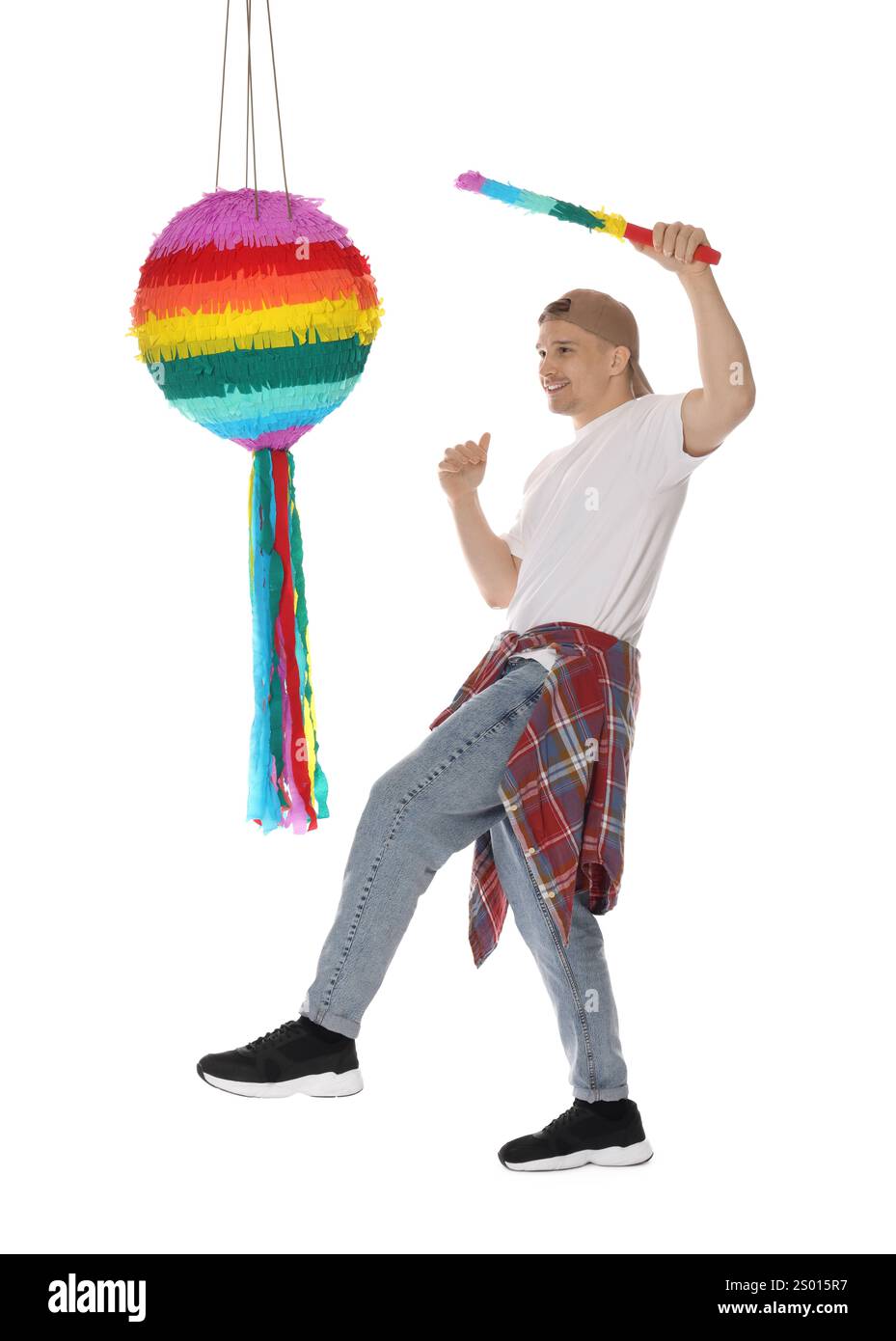 Happy man breaking pinata on white background Stock Photo - Alamy