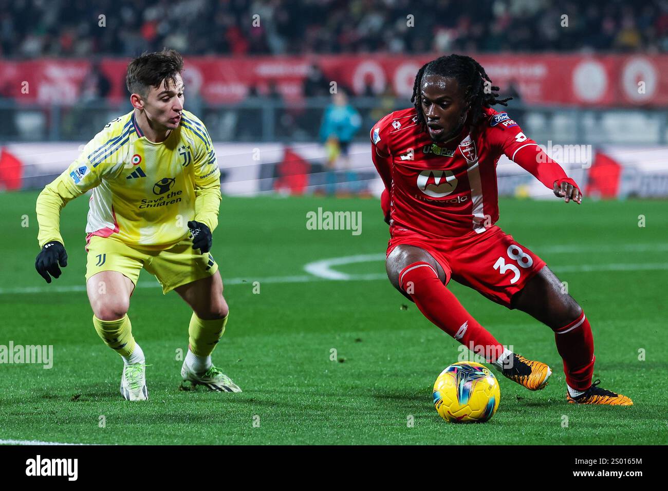 Monza, Italy. 22nd Dec, 2024. (R-L) Warren Bondo of AC Monza competes ...