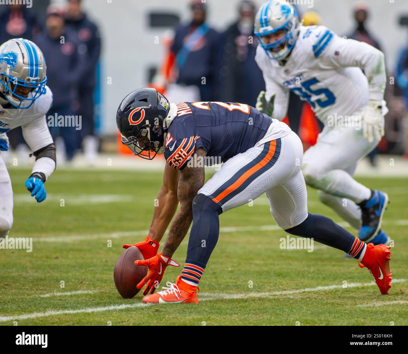 Chicago Bears DJ Moore (2) picks up a fumble during an NFL football ...
