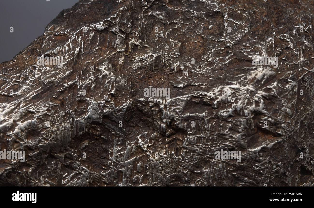 Rough meteorite surface, abstract natural background photo texture. A ...