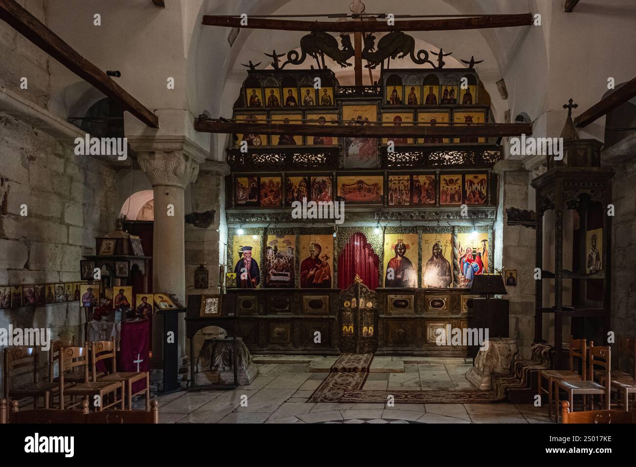 Ancient icons and frescoes hanging on a walls of a 14th-century ...