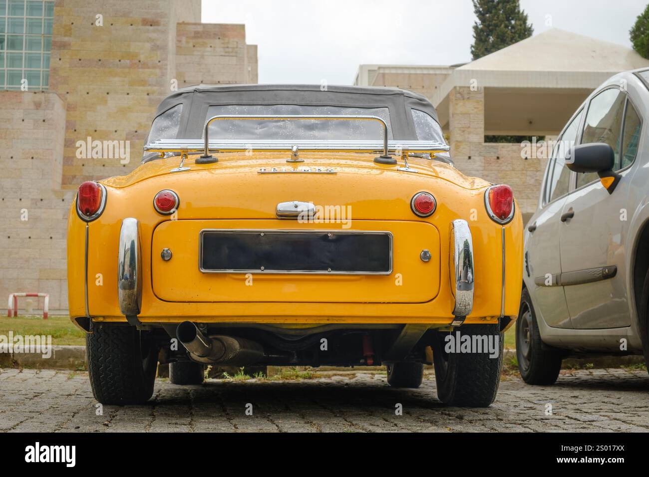 Lisbon, Portugal - Oct 15, 2023: Rear view of yellow convertible ...