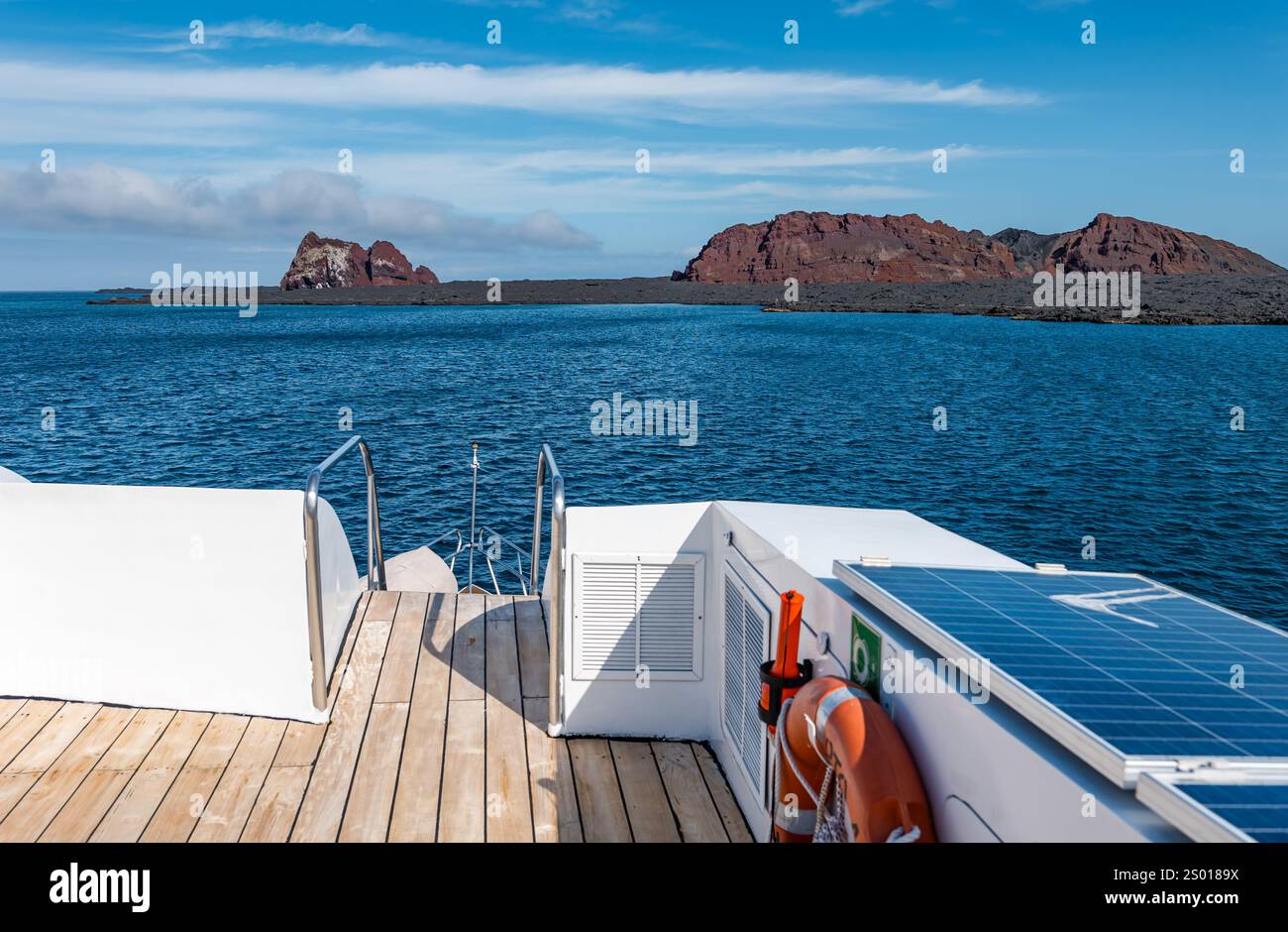 View of the barren volcanic rock landscape of Santiago Island from the ...