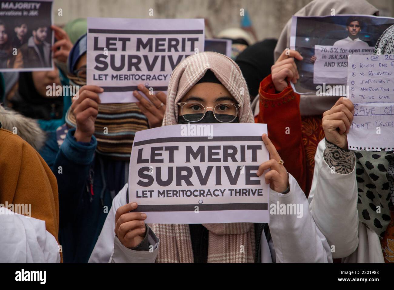Kashmiri medical students hold placards as they take part in a protest ...