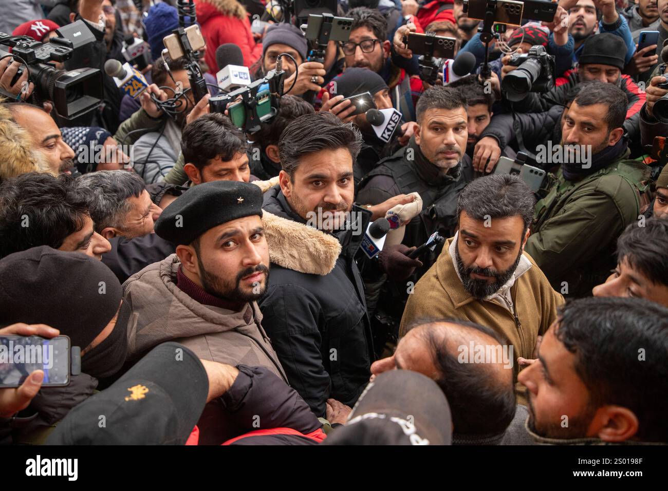 Jammu and Kashmir legislative Assembly member Waheed Para (C) and The ...