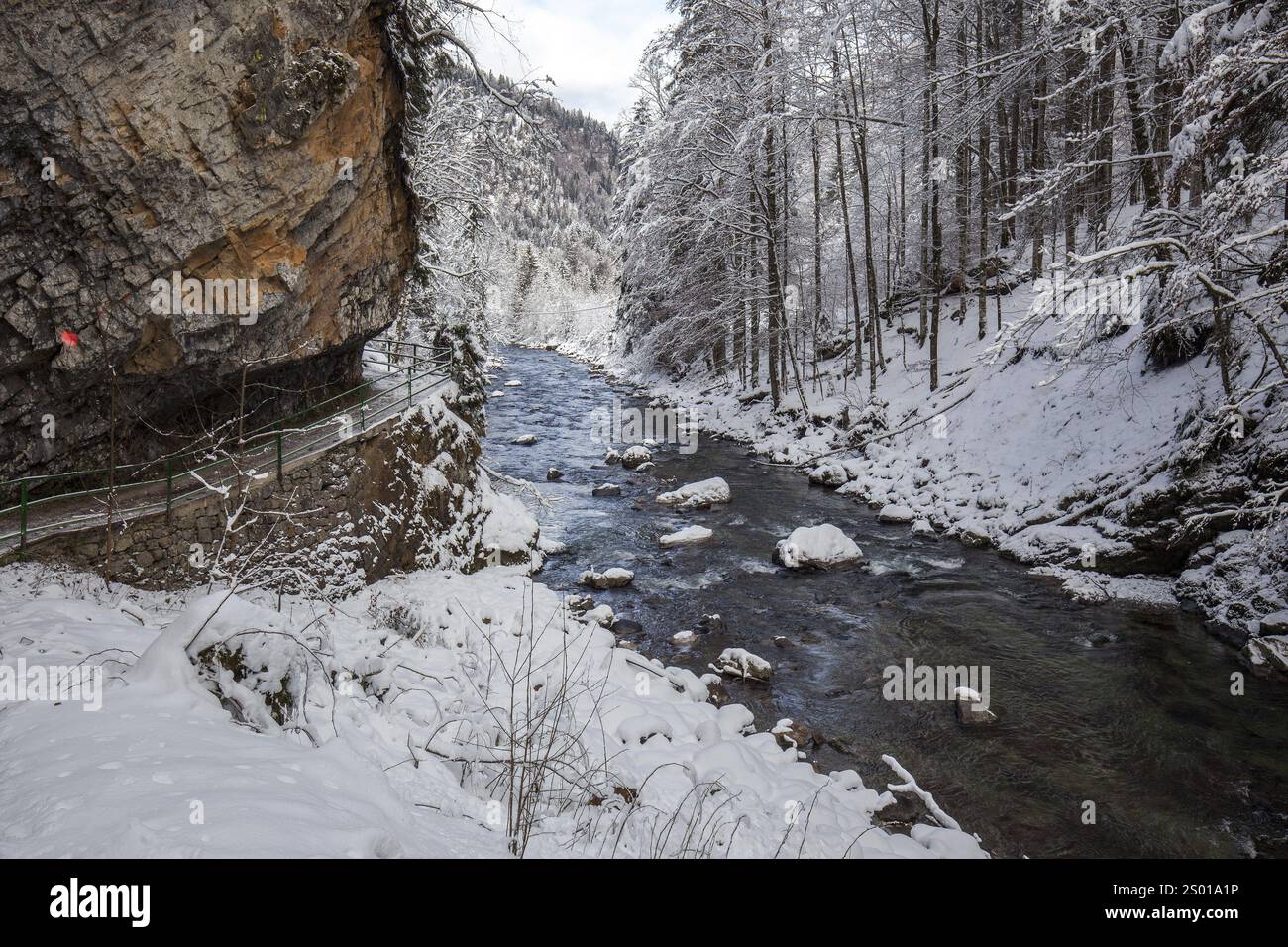 Winter, snowy landscape, river Breitach and hiking trail through the ...