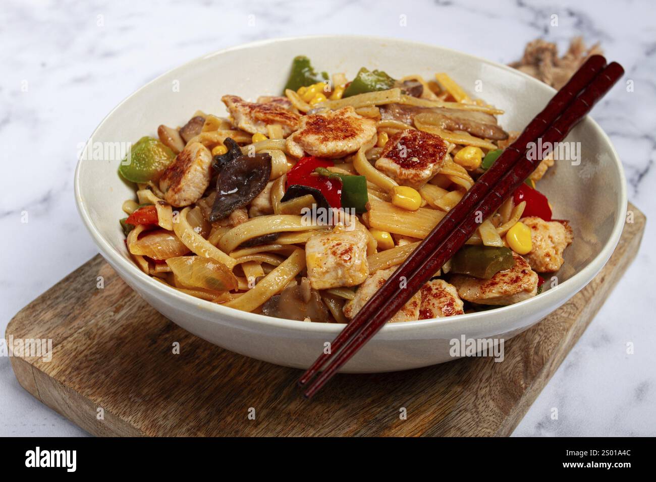 Fried noodles with chicken meat and vegetables, Bami Goreng, Indonesian ...