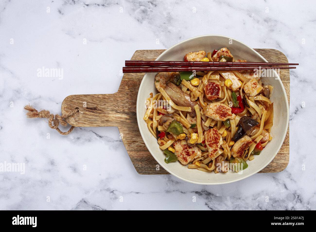 Fried noodles with chicken meat and vegetables, Bami Goreng, Indonesian ...