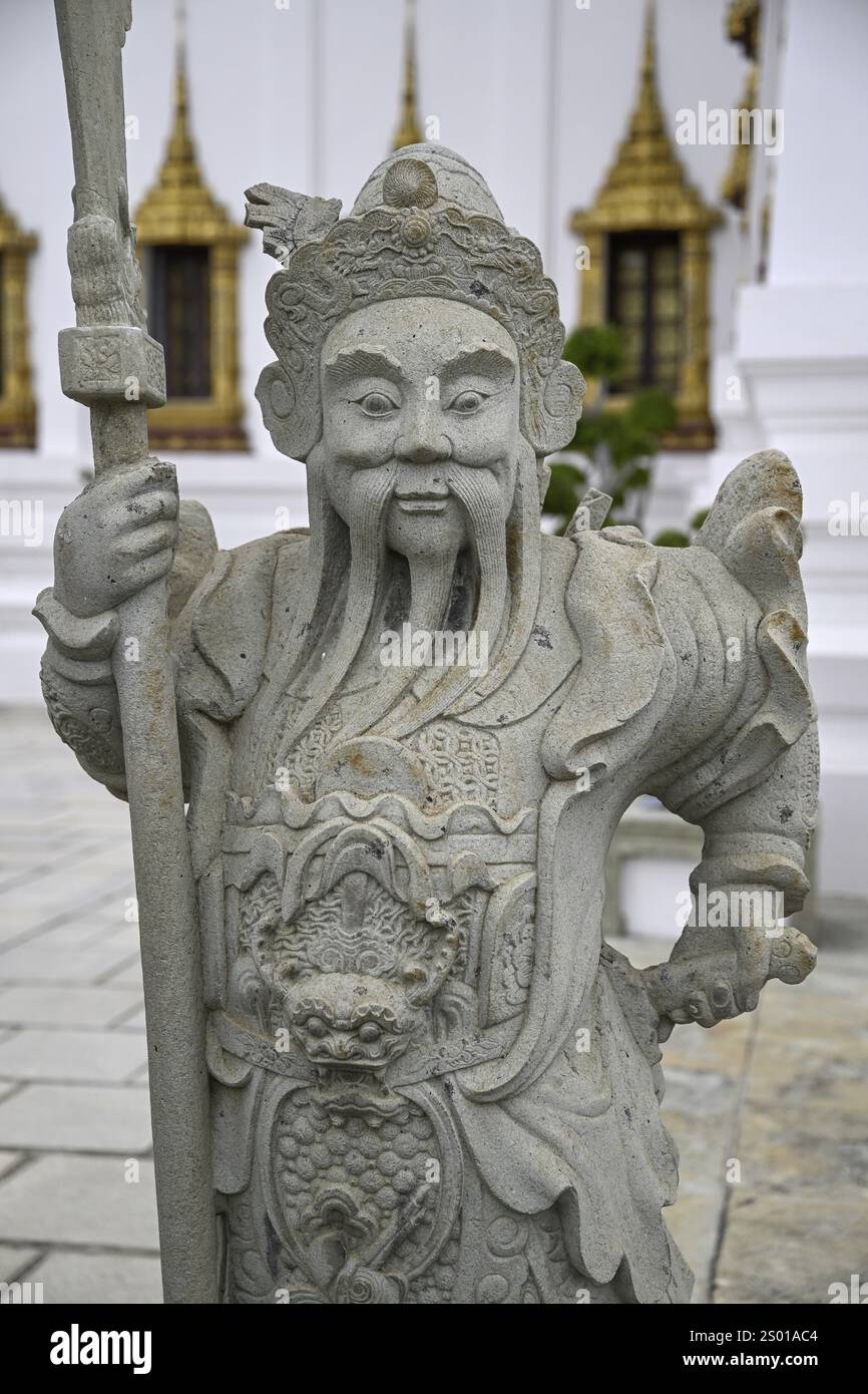 Stone statue of a Chinese warrior, guardian, Wat Phra Kaew, Temple of ...