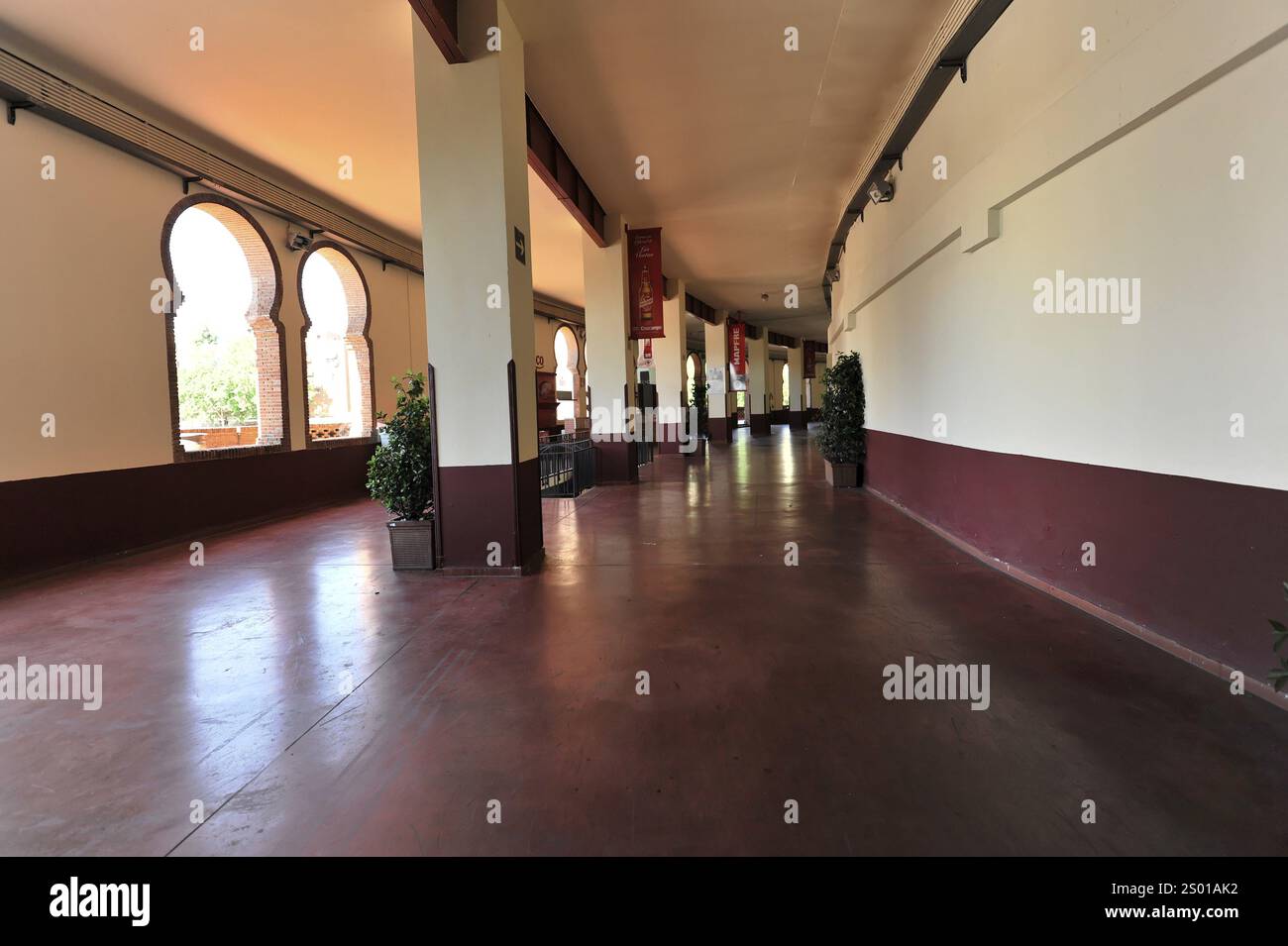 Madrid, Spain, Europe, Long corridor with arched windows, white walls ...