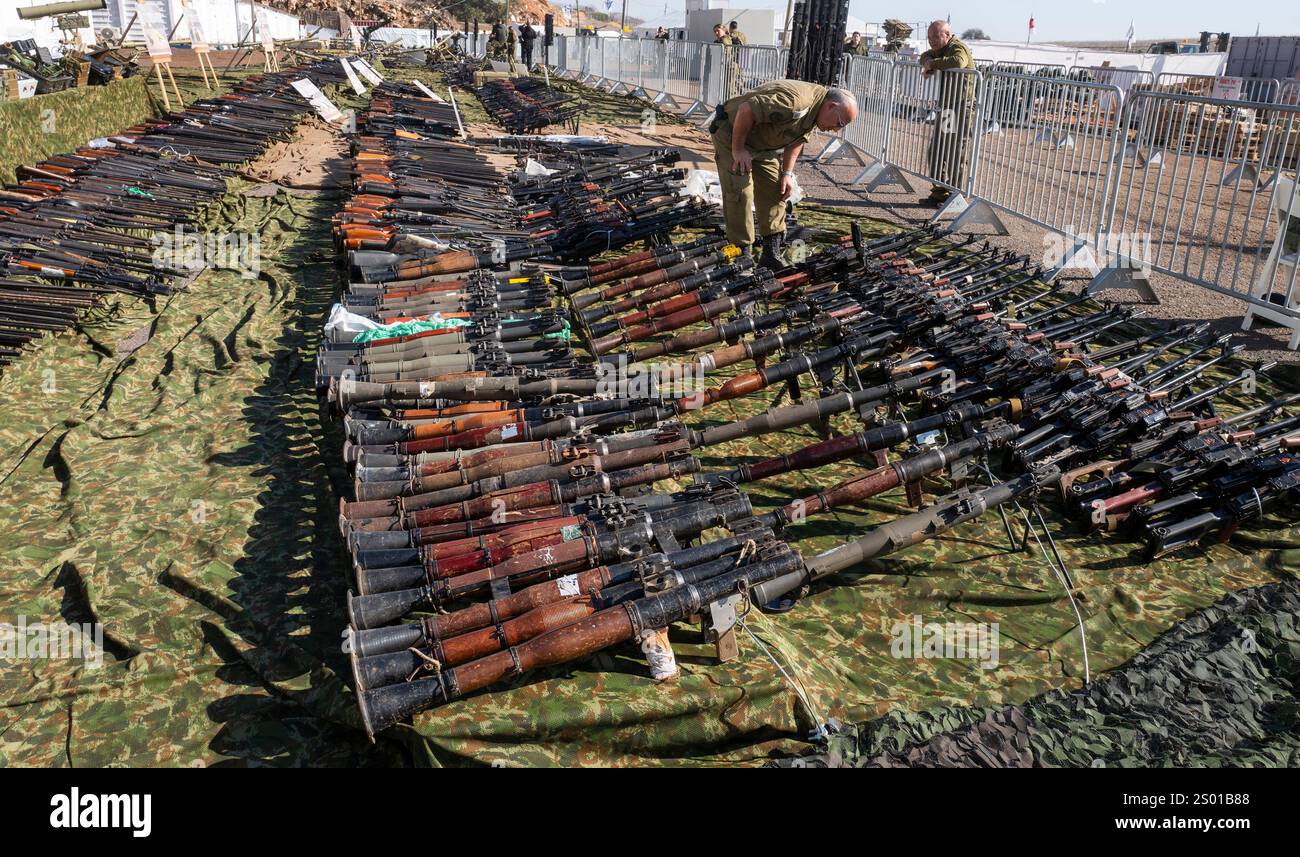 Amirim, Israel. 23rd Dec, 2024. An Israeli soldiers look at some of the ...