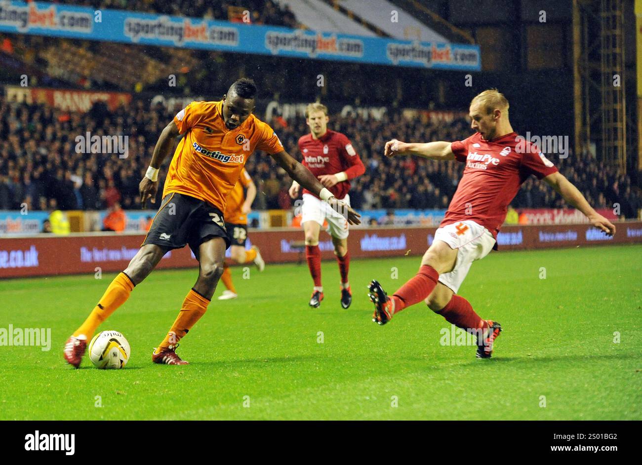 Tongo Doumbia of Wolverhampton Wanderers and Simon Gillett of ...