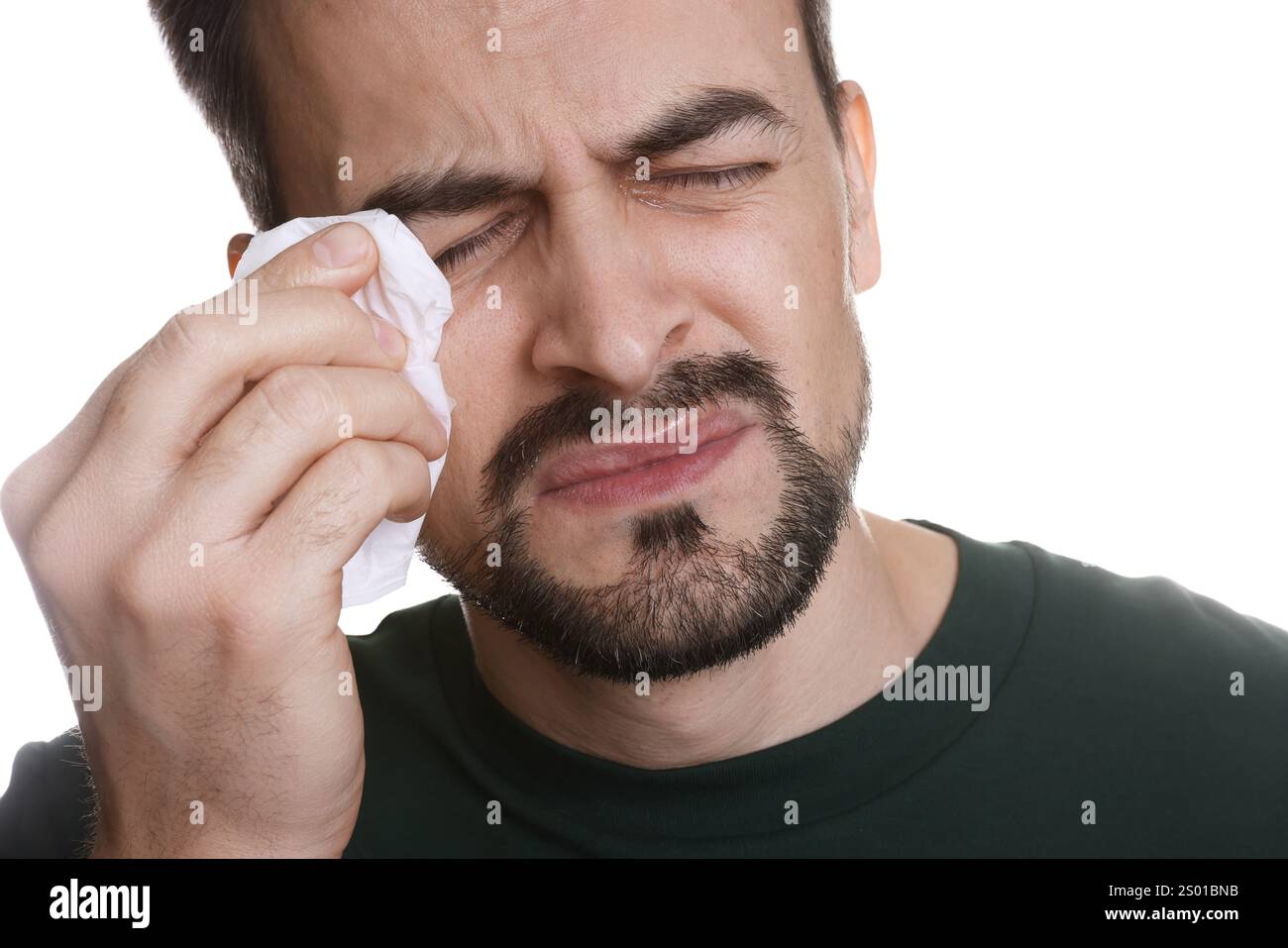 Sad man with paper tissue crying on white background Stock Photo - Alamy