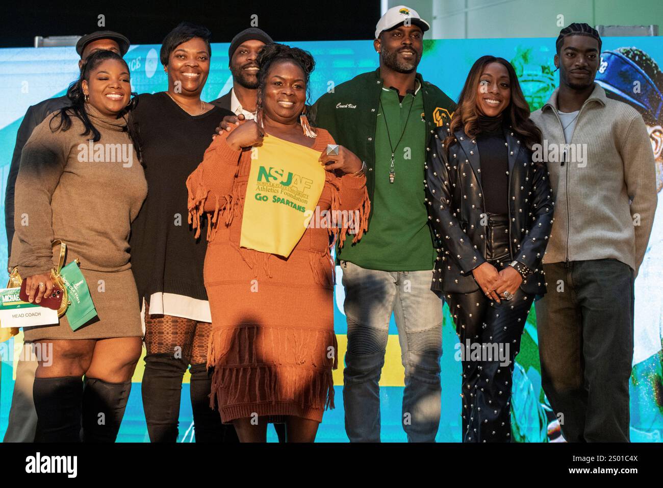 Michael Vick takes a photo with family after being named the next head ...