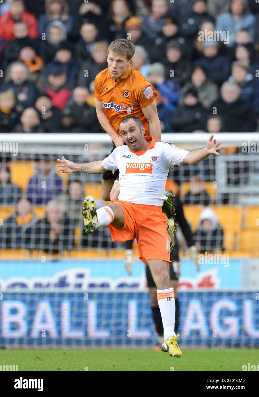 Christophe Berra of Wolverhampton Wanderers and Gary Taylor-Fletcher of ...