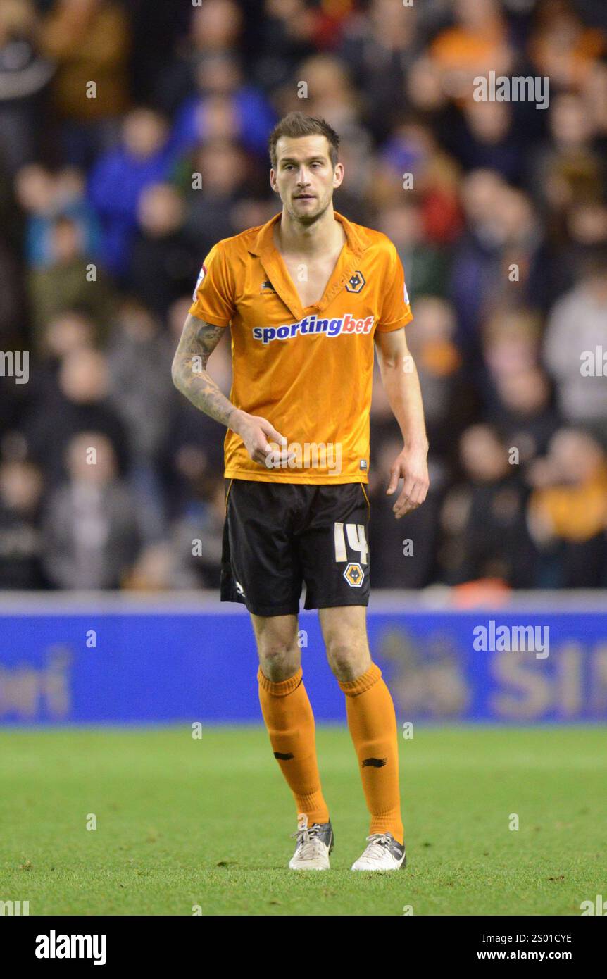 Roger Johnson of Wolverhampton Wanderers with his ripped shirt ...