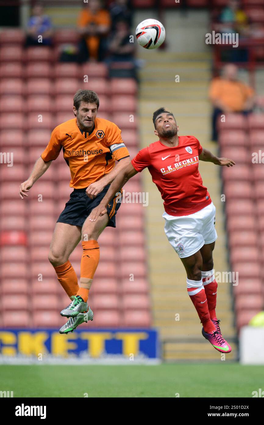 Sam Ricketts of Wolverhampton Wanderers and Scott Golbourne of Barnsley ...