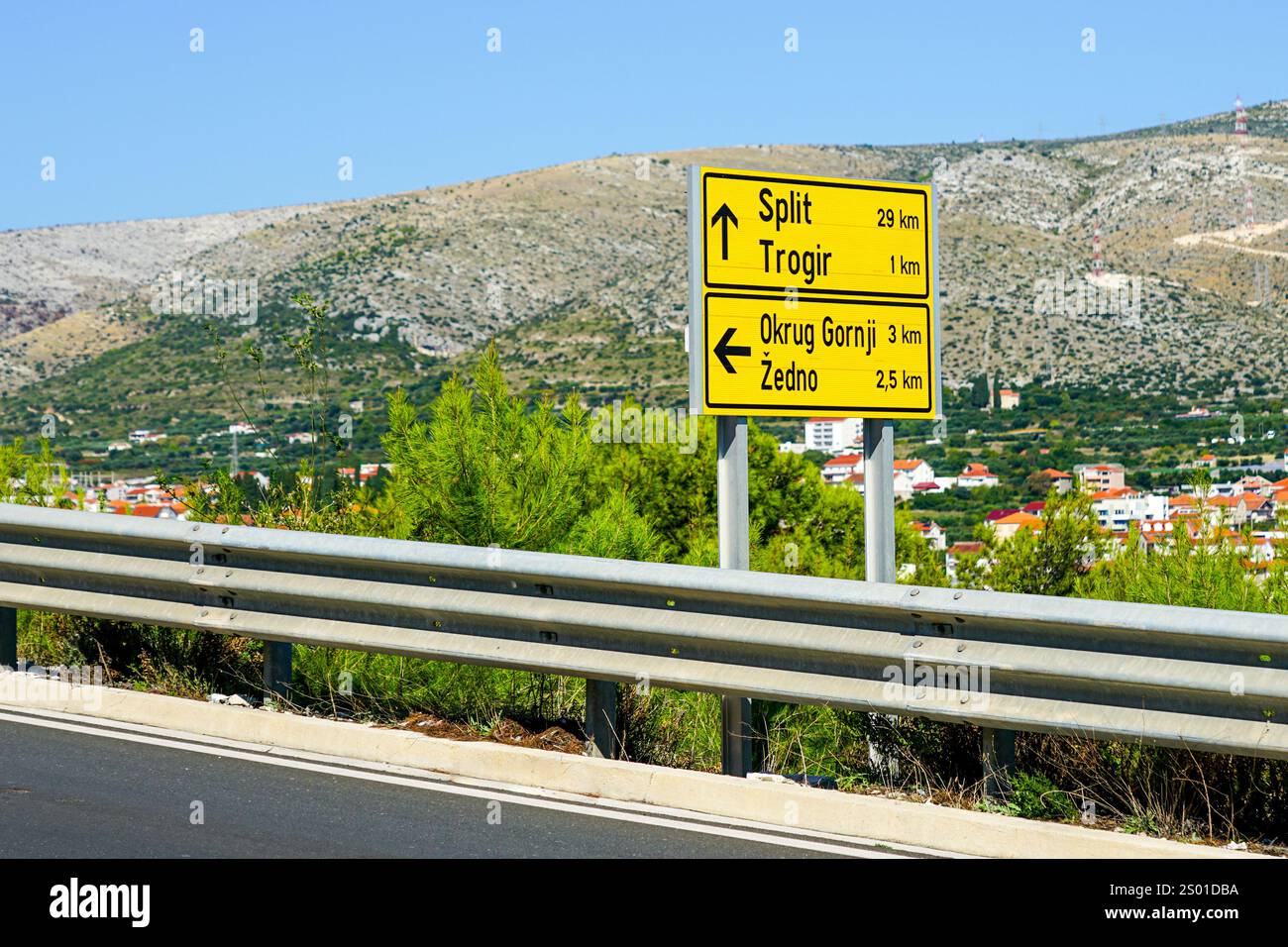 Yellow informative traffic sign with distance and directions to Split ...