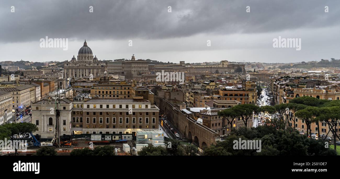 A panoramic view of Rome under a cloudy sky, showcasing St. Peter's ...