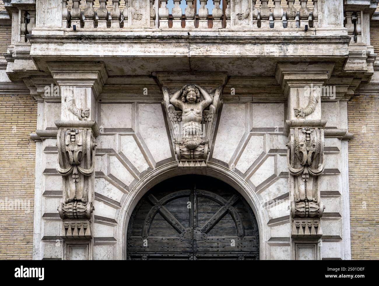 Architectural detail of a grand entrance featuring ornate stone ...