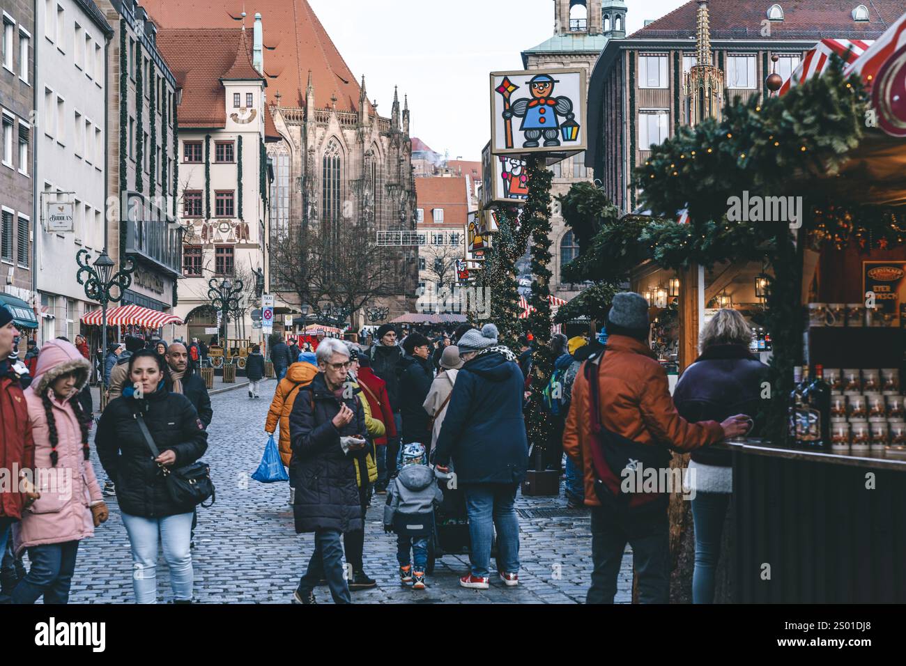 Nuremberg, Germany - December 4, 2024: People enjoy the famous ...
