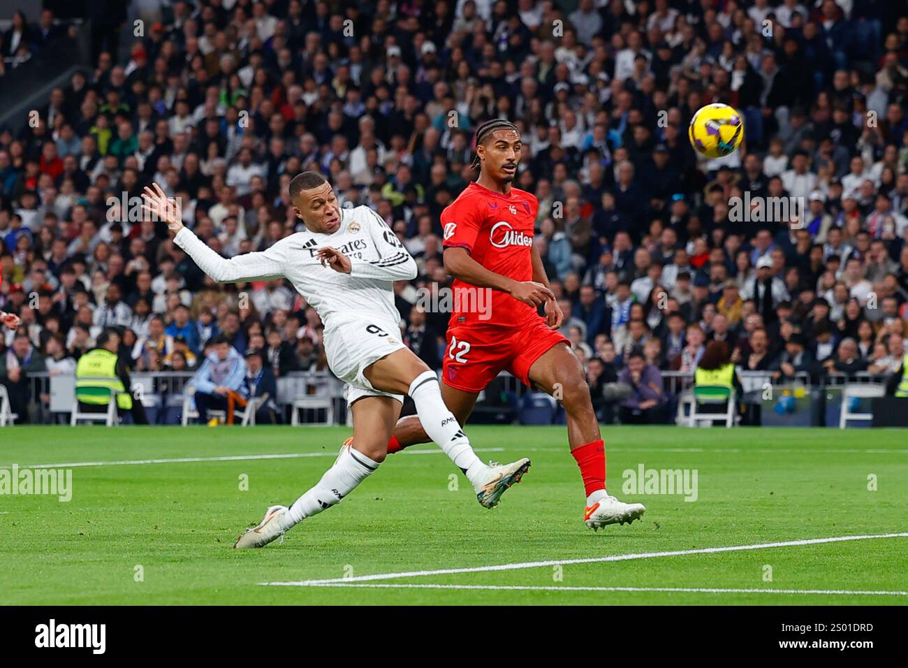 Kylian Mbappe of Real Madrid and Loic Bade of Sevilla FC during the ...